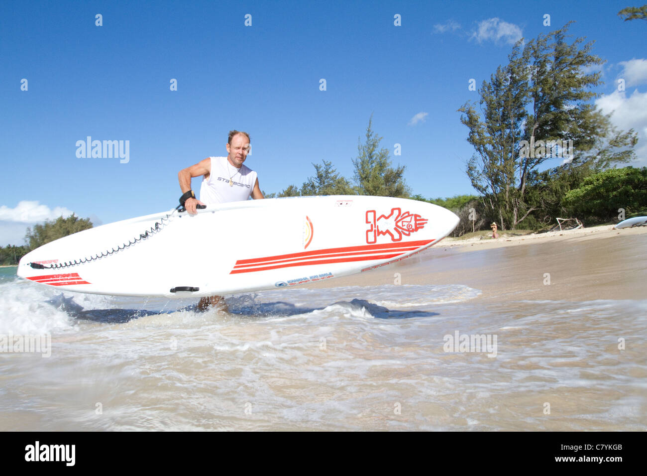 Pro stand up paddle board racer Stock Photo - Alamy