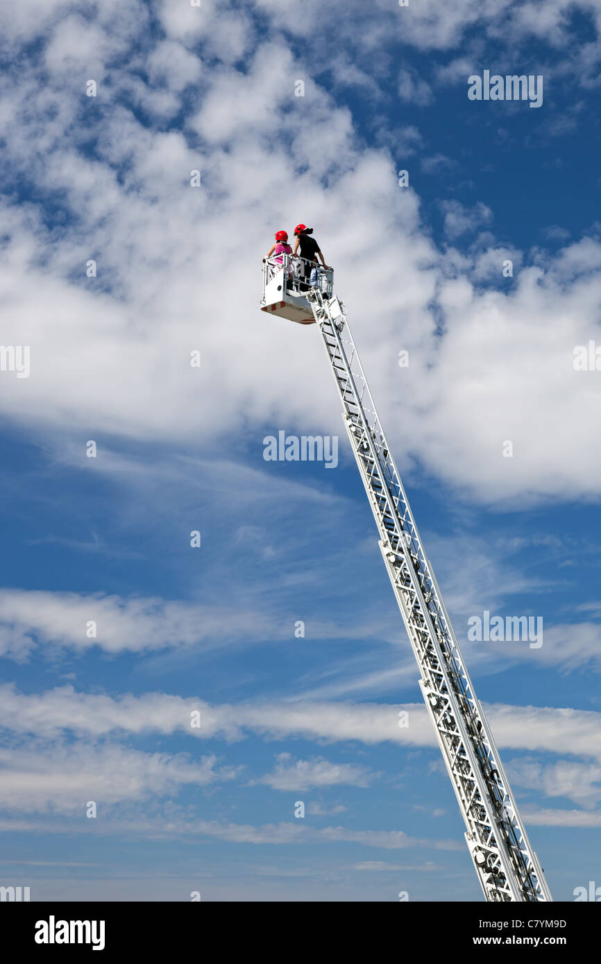 Ladder extended on a fire truck Stock Photo - Alamy