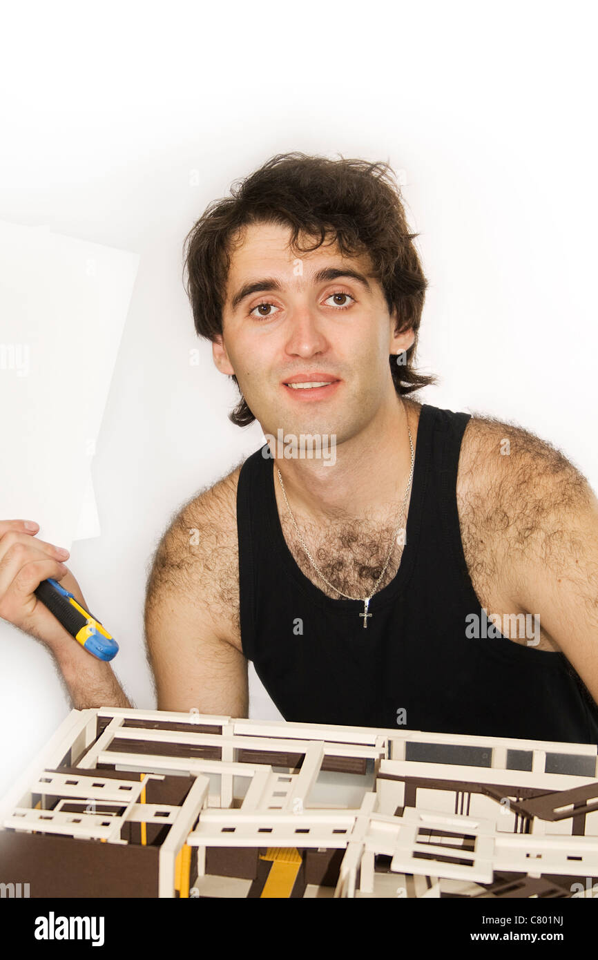 Architect men working on a model of a new construction Stock Photo - Alamy