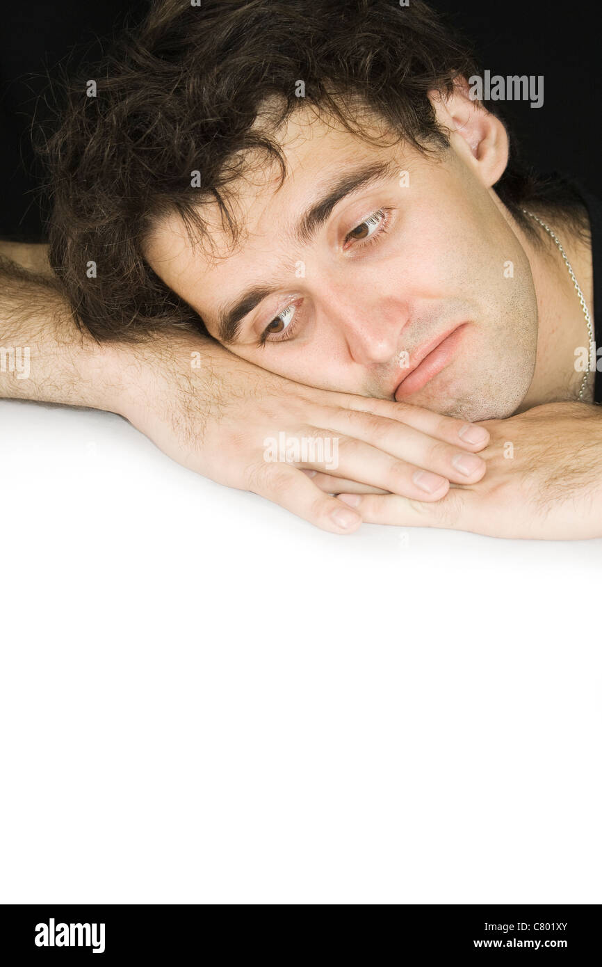 A portrait of a sad young man Stock Photo - Alamy