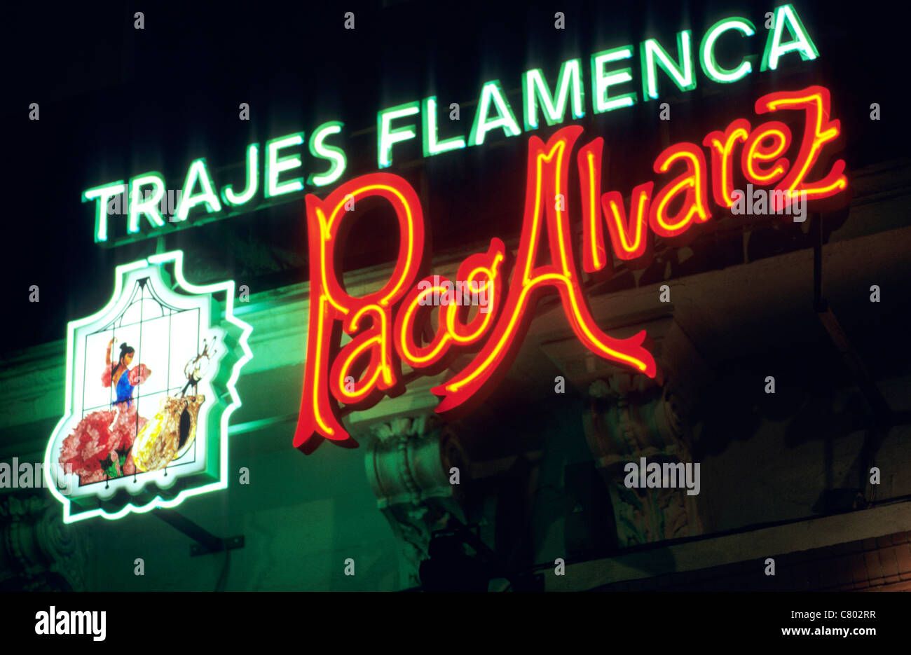 Spain, Andalusia, Sevilla, shop advertising neon sign Stock Photo - Alamy