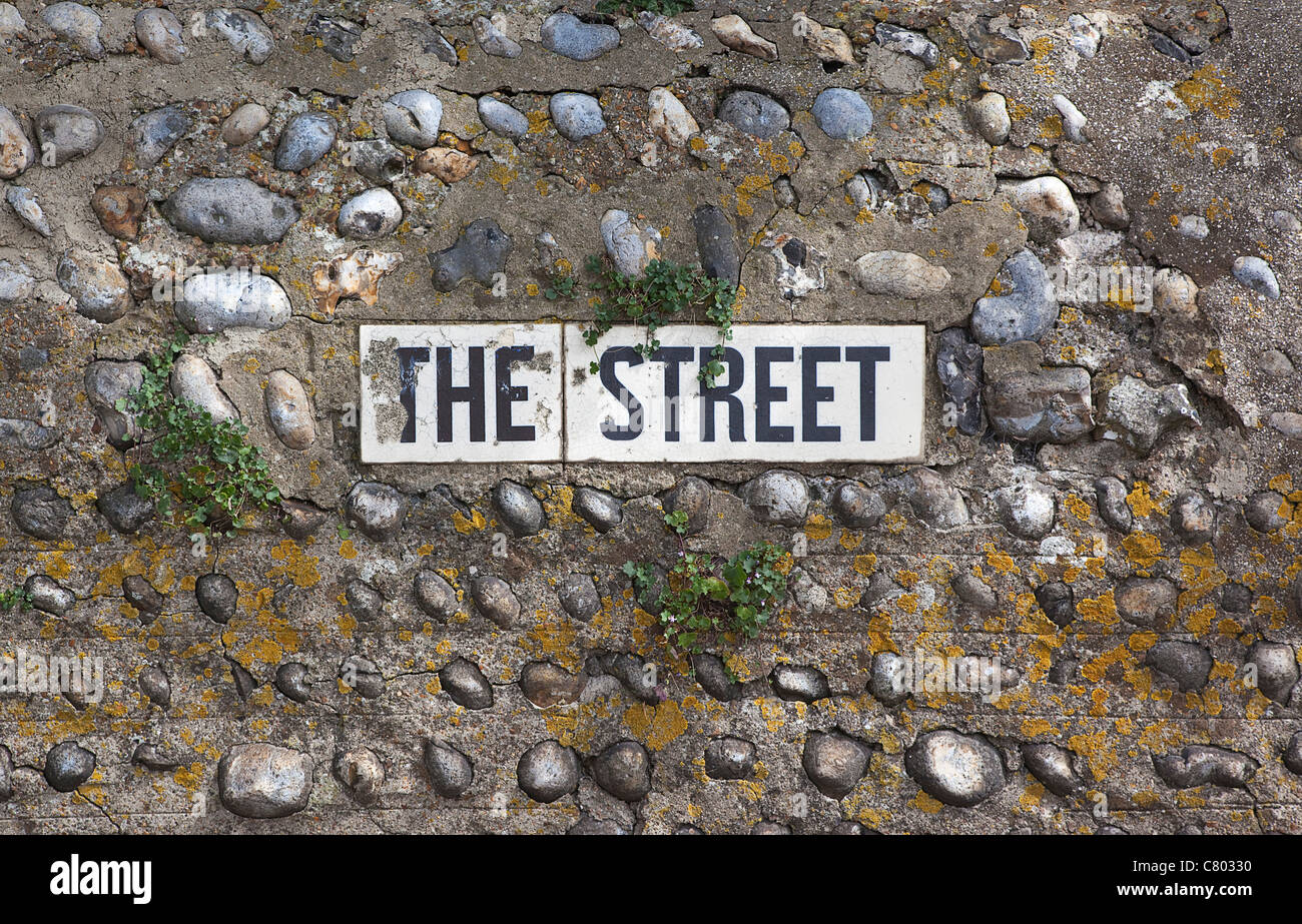 Communications, Signage, the street name embedded in flint wall Stock ...