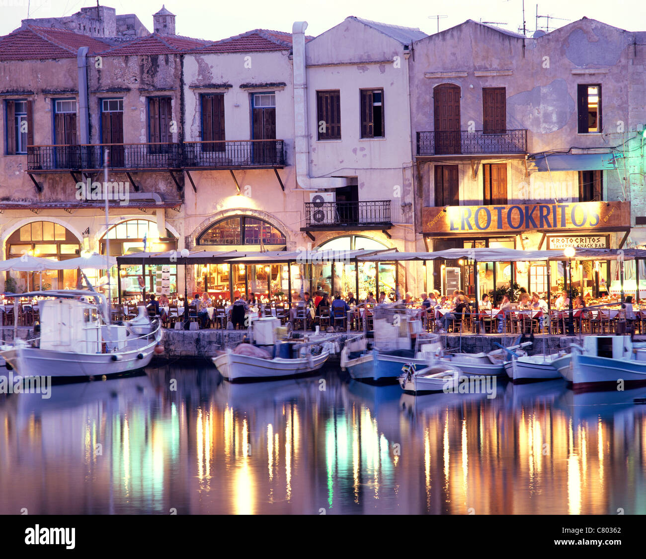 Europe, Greece, Western Crete, Rethymnon the Venetian harbour at dusk ...