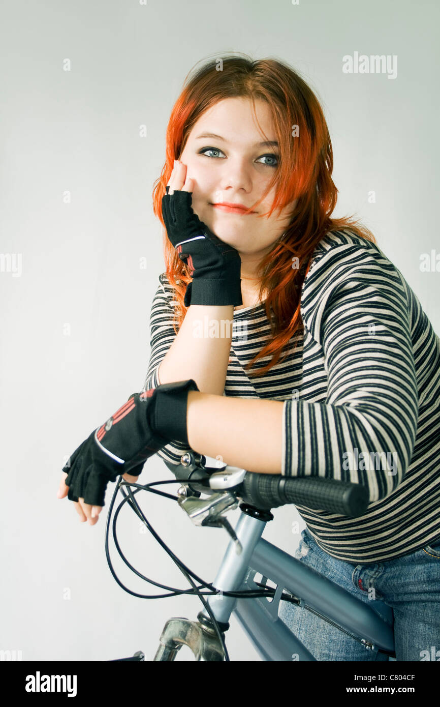 A young girl Riding, lean one's elbows at its Center Stock Photo - Alamy
