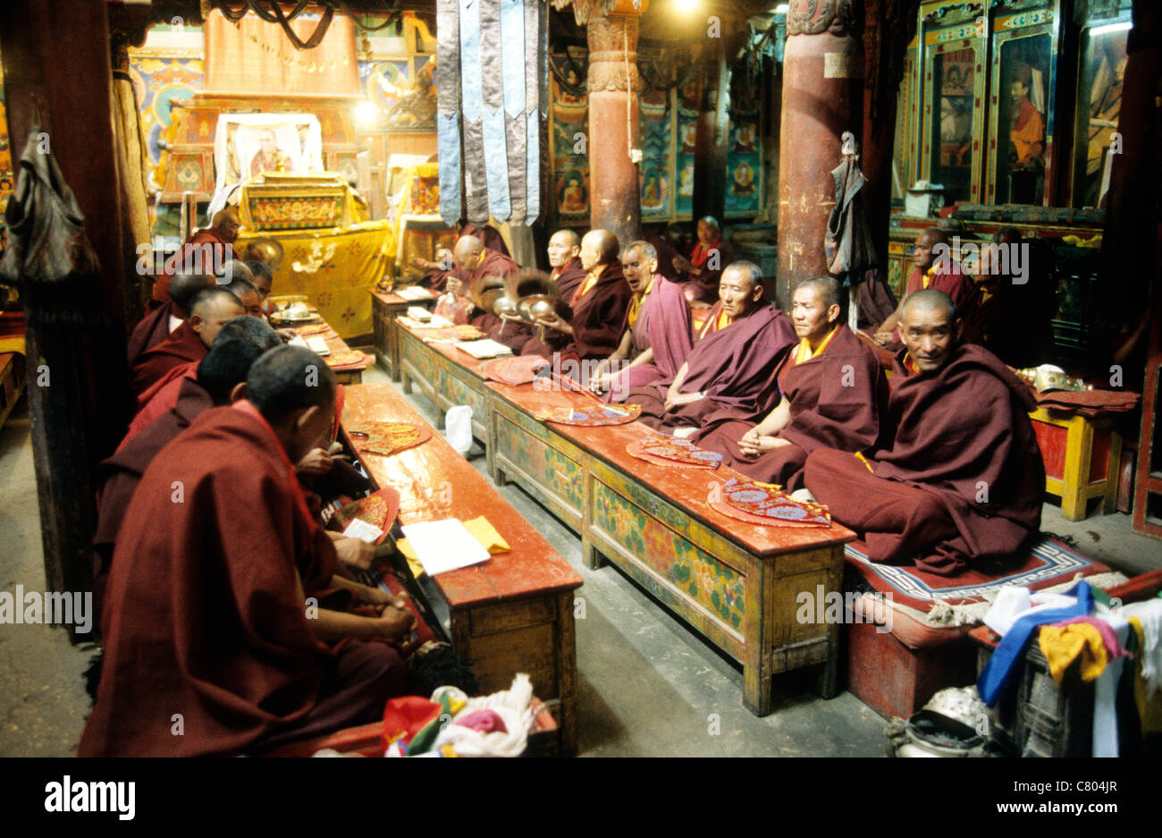 India, Ladakh, monks praying inside Hemis Gompa monastery Stock Photo ...