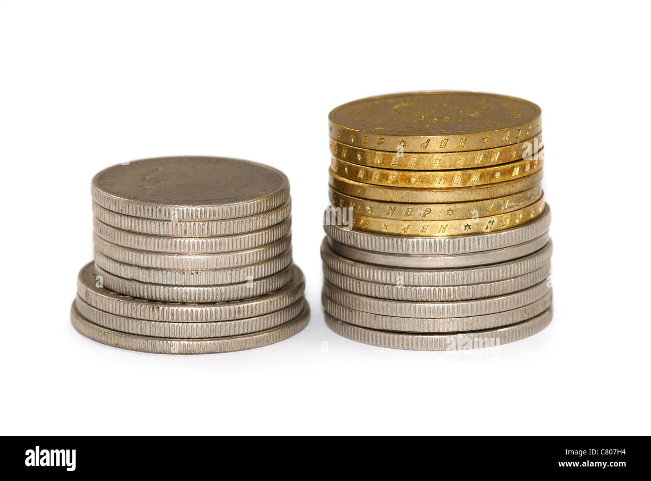 Golden coins isolated on white background Stock Photo - Alamy