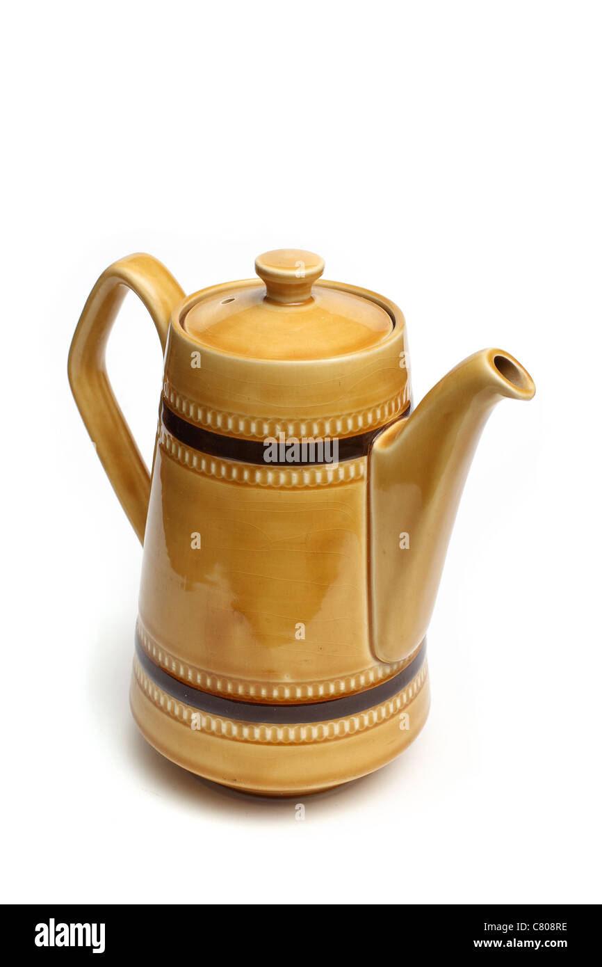 Teapot pouring out tea Cut Out Stock Images & Pictures - Alamy