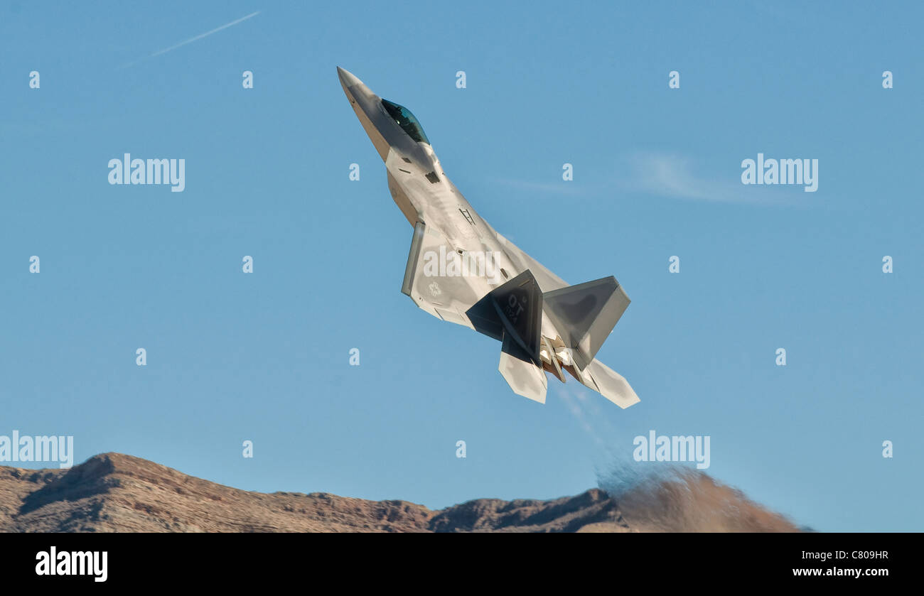 A U.S. Air Force F-22 Raptor takes off from Nellis Air Force Base ...