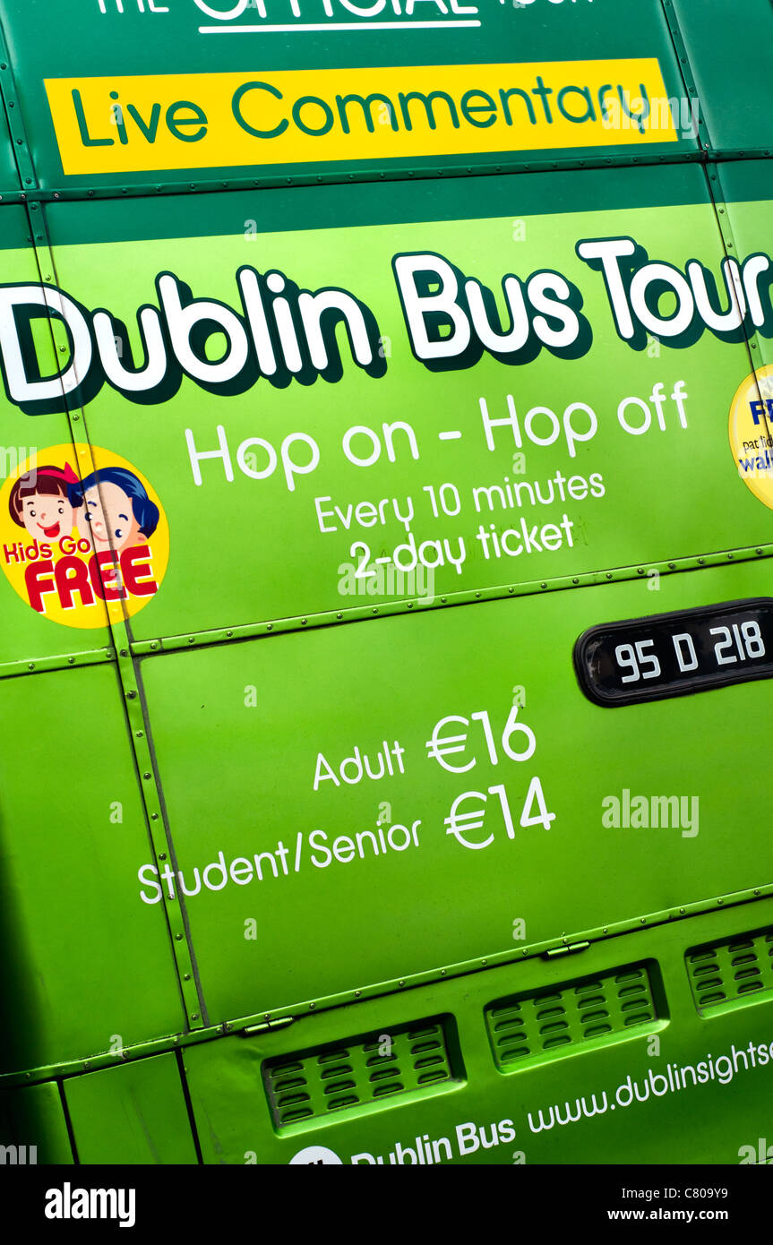 A green double decker tour bus in Dublin, Ireland Stock Photo - Alamy
