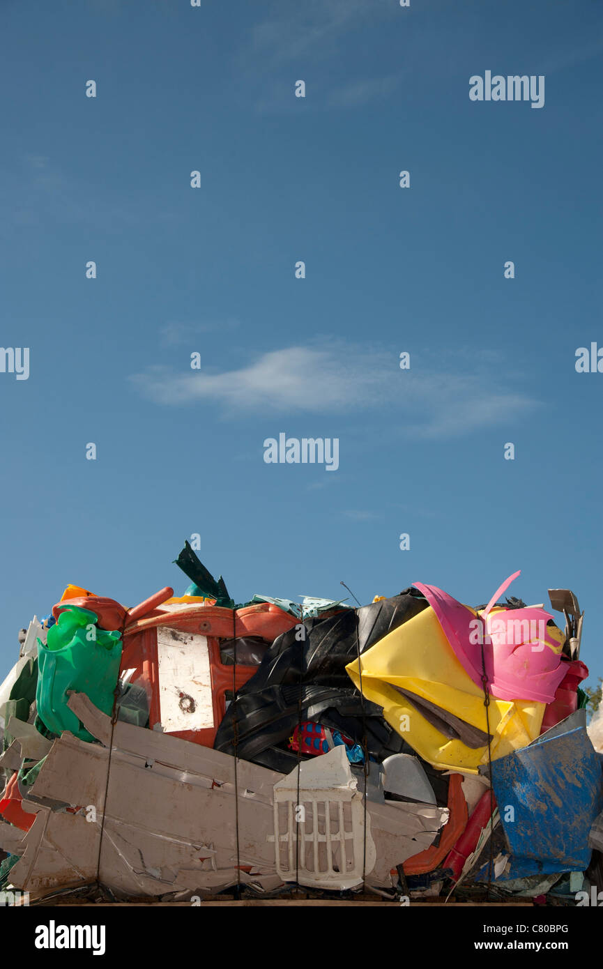 Bales of compacted hard plastic waste awaiting collection for recycling ...
