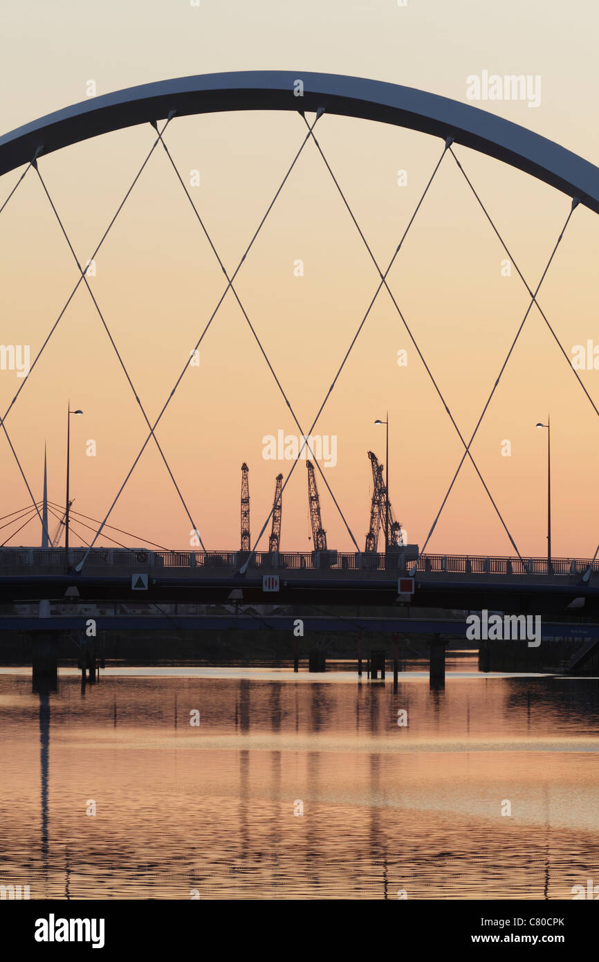 Clyde Arc Bridge looking west along the River Clyde at sunset, Glasgow ...
