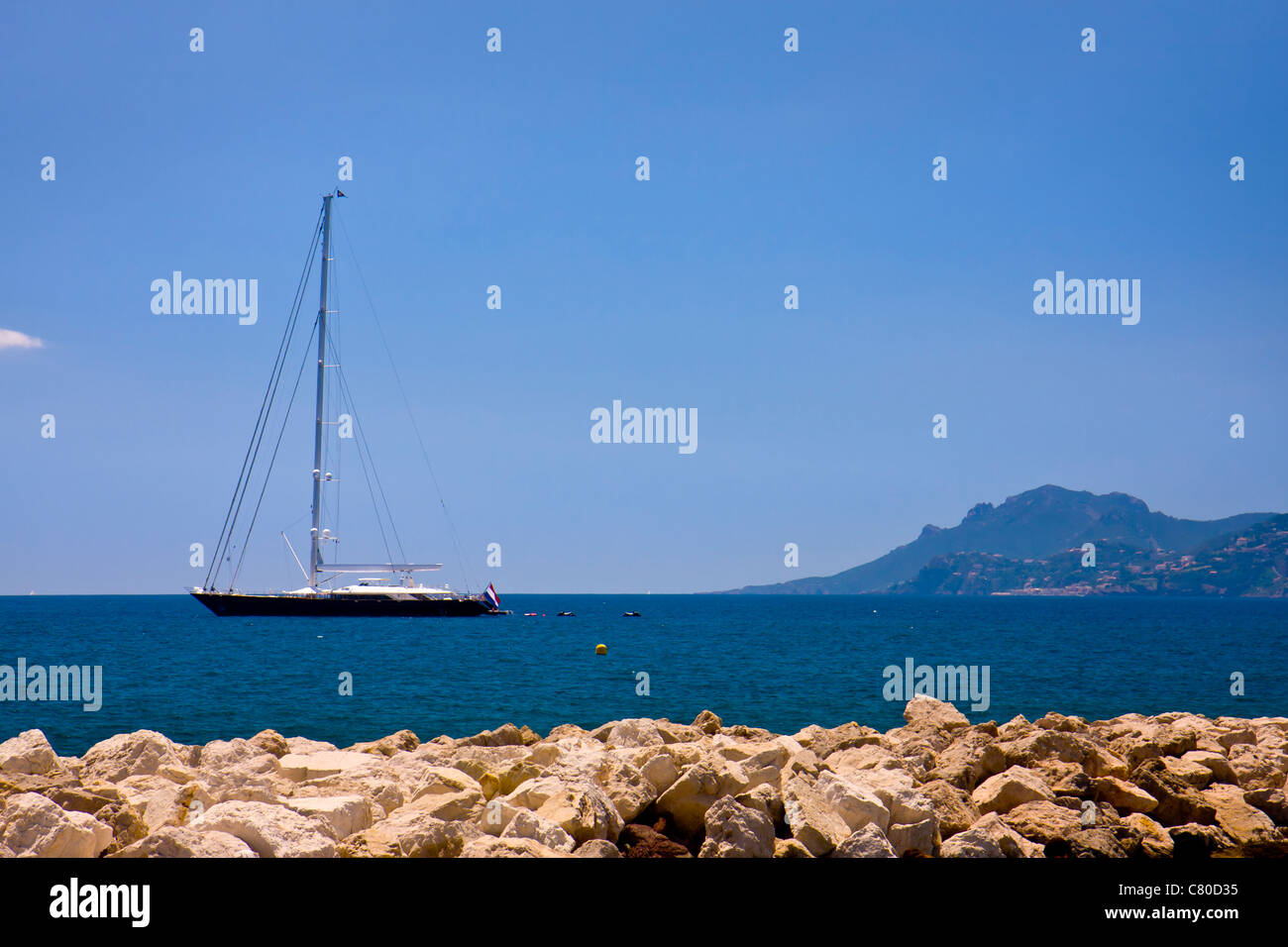 Catamaran anchored off the breakwater in Cannes, Provence France Stock ...