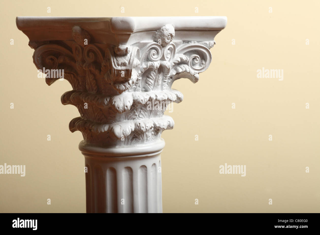 white column indoor on yellow background Stock Photo - Alamy