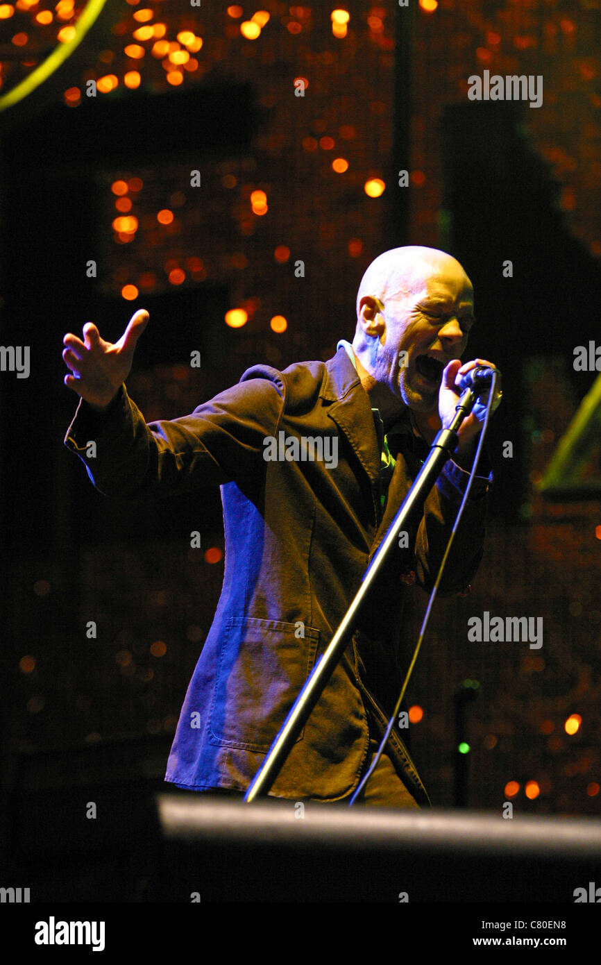 REM performing on the Pyramid stage at the Glastonbury Festival 2003 ...