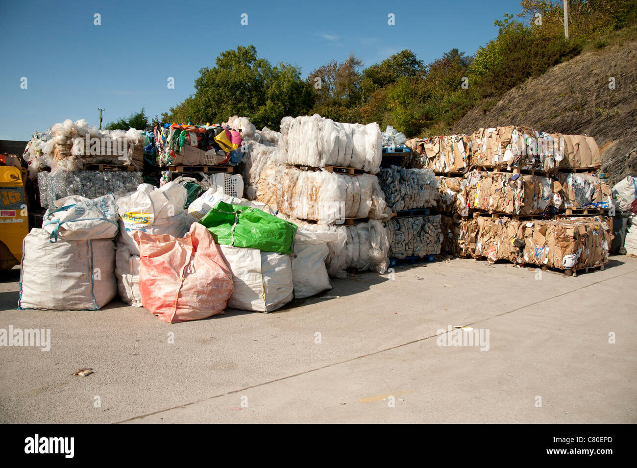 Bales of compacted waste awaiting collection for recycling UK Stock ...