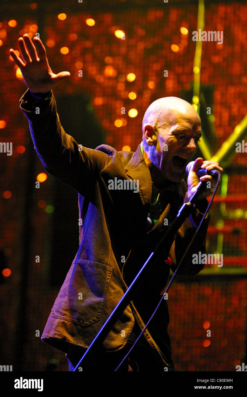 REM performing on the Pyramid stage at the Glastonbury Festival 2003 ...