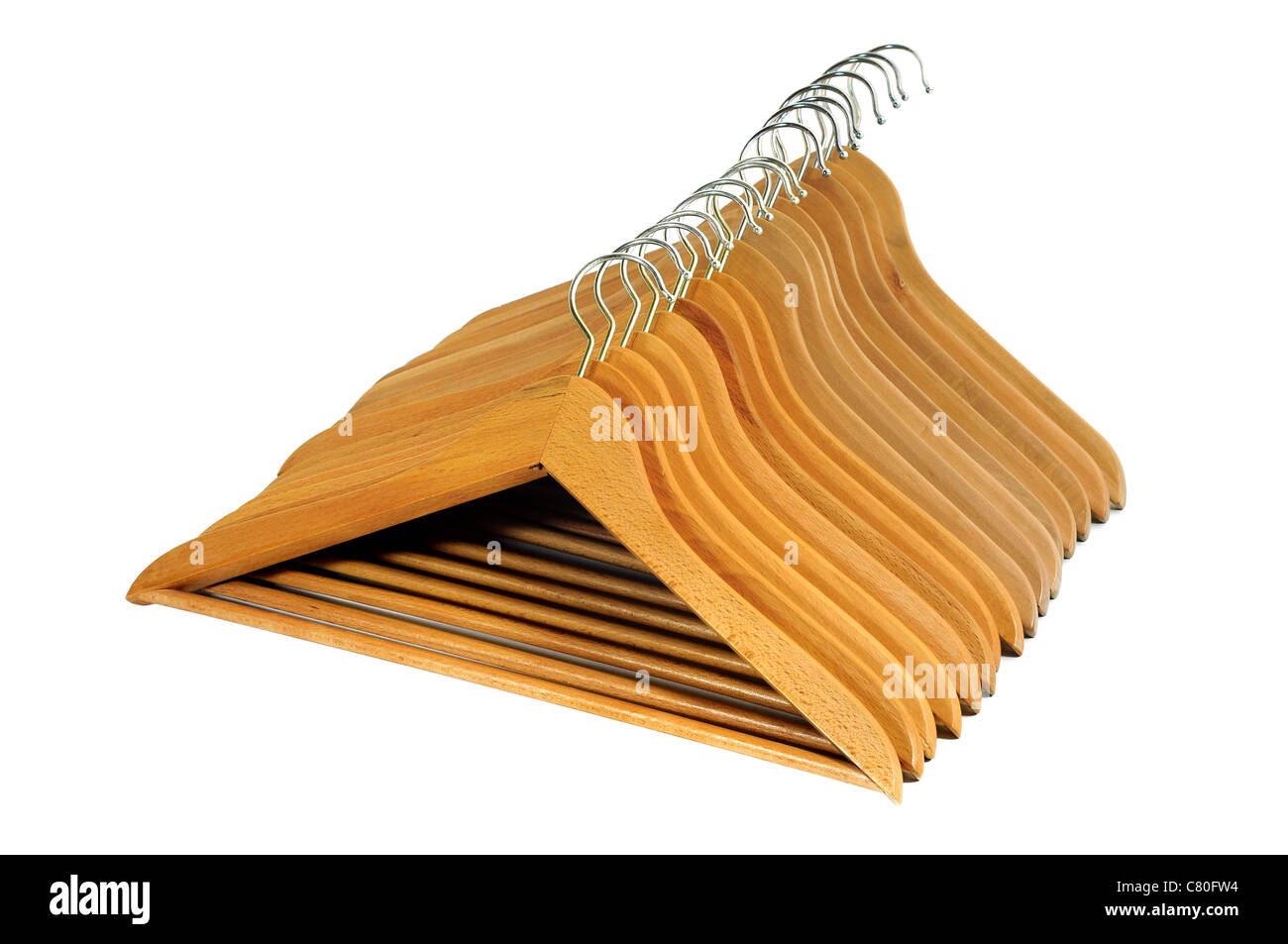 Stack of wood coat hangers on white background Stock Photo - Alamy