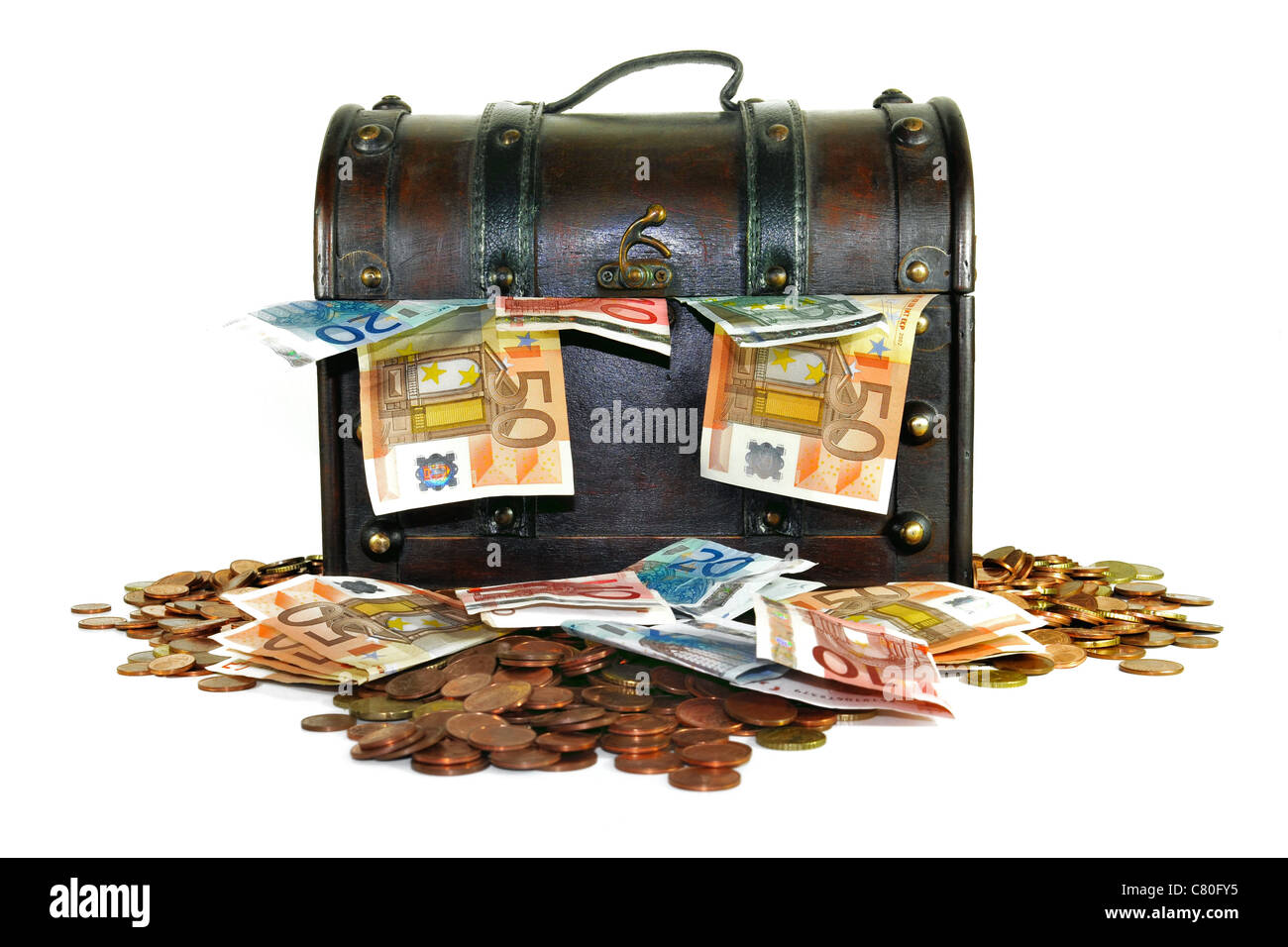 Dark brown money chest with Euro currency - banknotes and coins - on ...