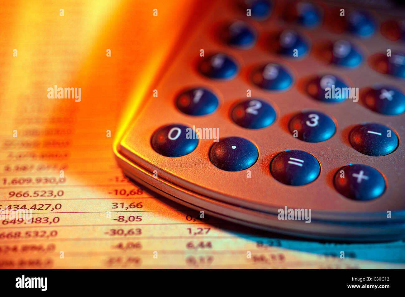 Calculator and economic plan Stock Photo - Alamy