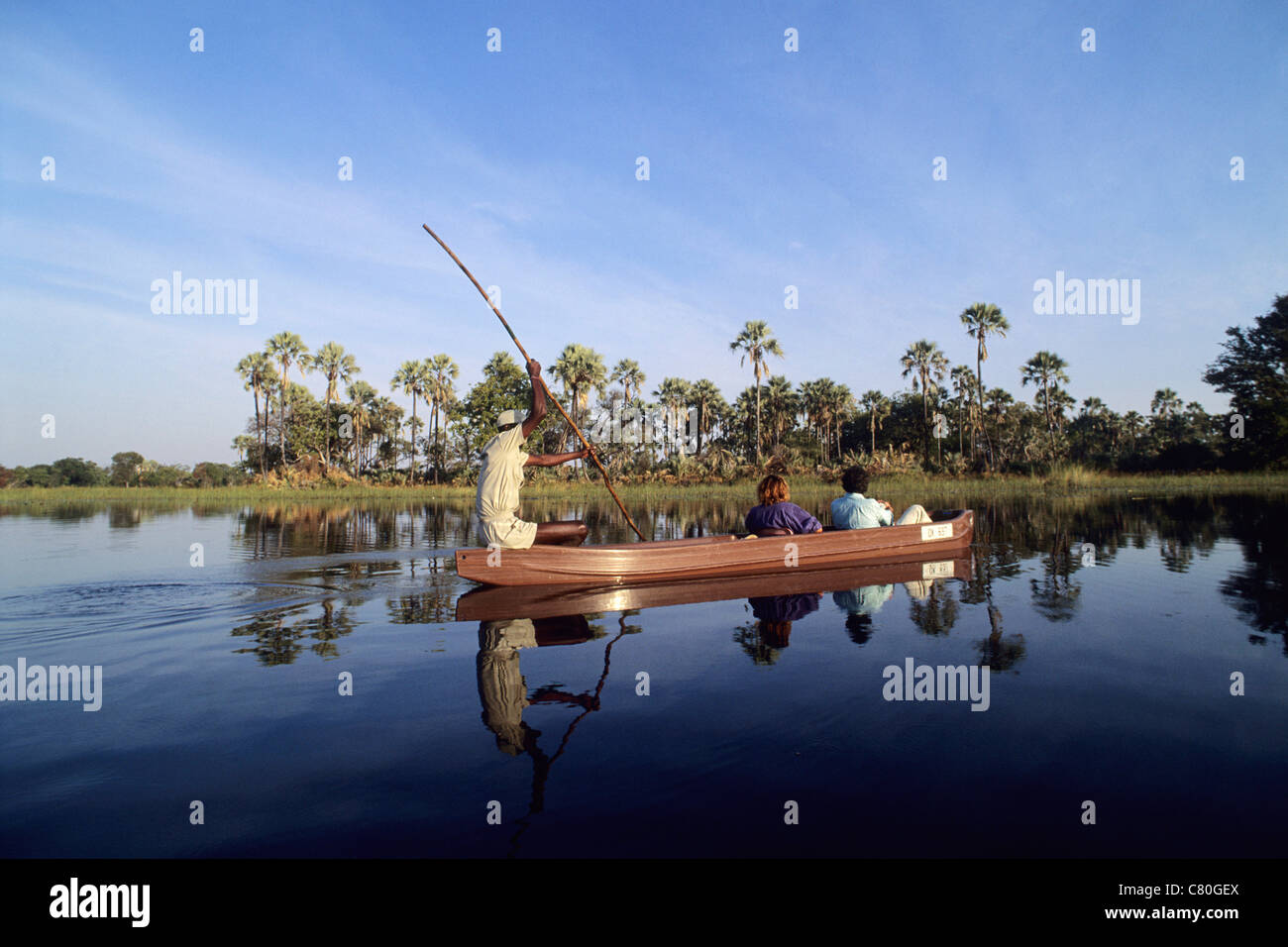 Okavango delta people boats hi-res stock photography and images - Alamy