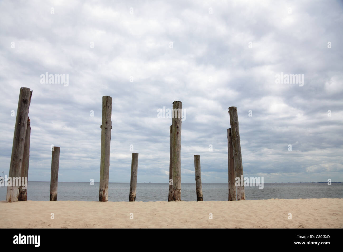 rows of piles on the sea beach - outdoor Stock Photo - Alamy