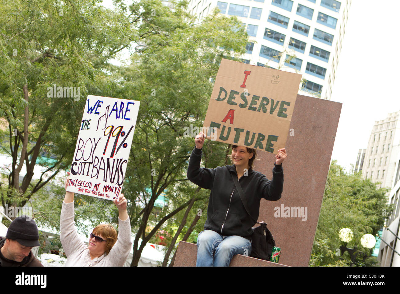 Protesters hold signs at the Occupy Seattle protest rally Stock Photo ...