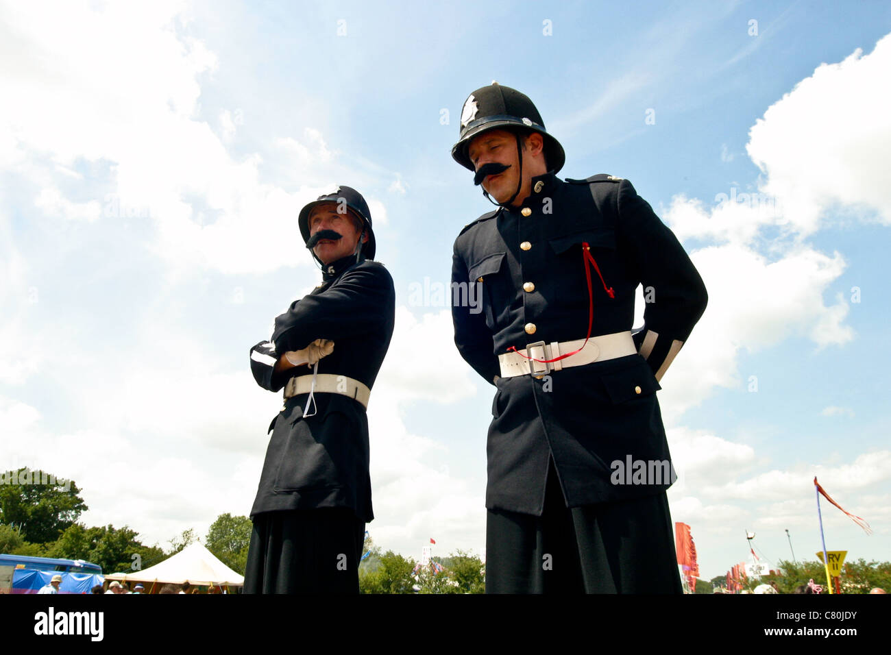 Performance police men on stilts, Glastonbury Festival 2003, Somerset ...