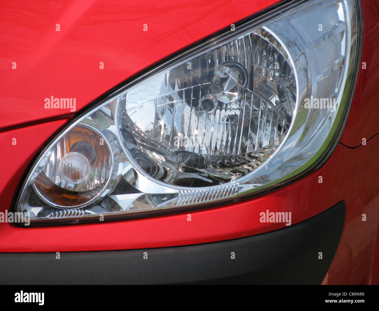 headlight of red car Stock Photo - Alamy