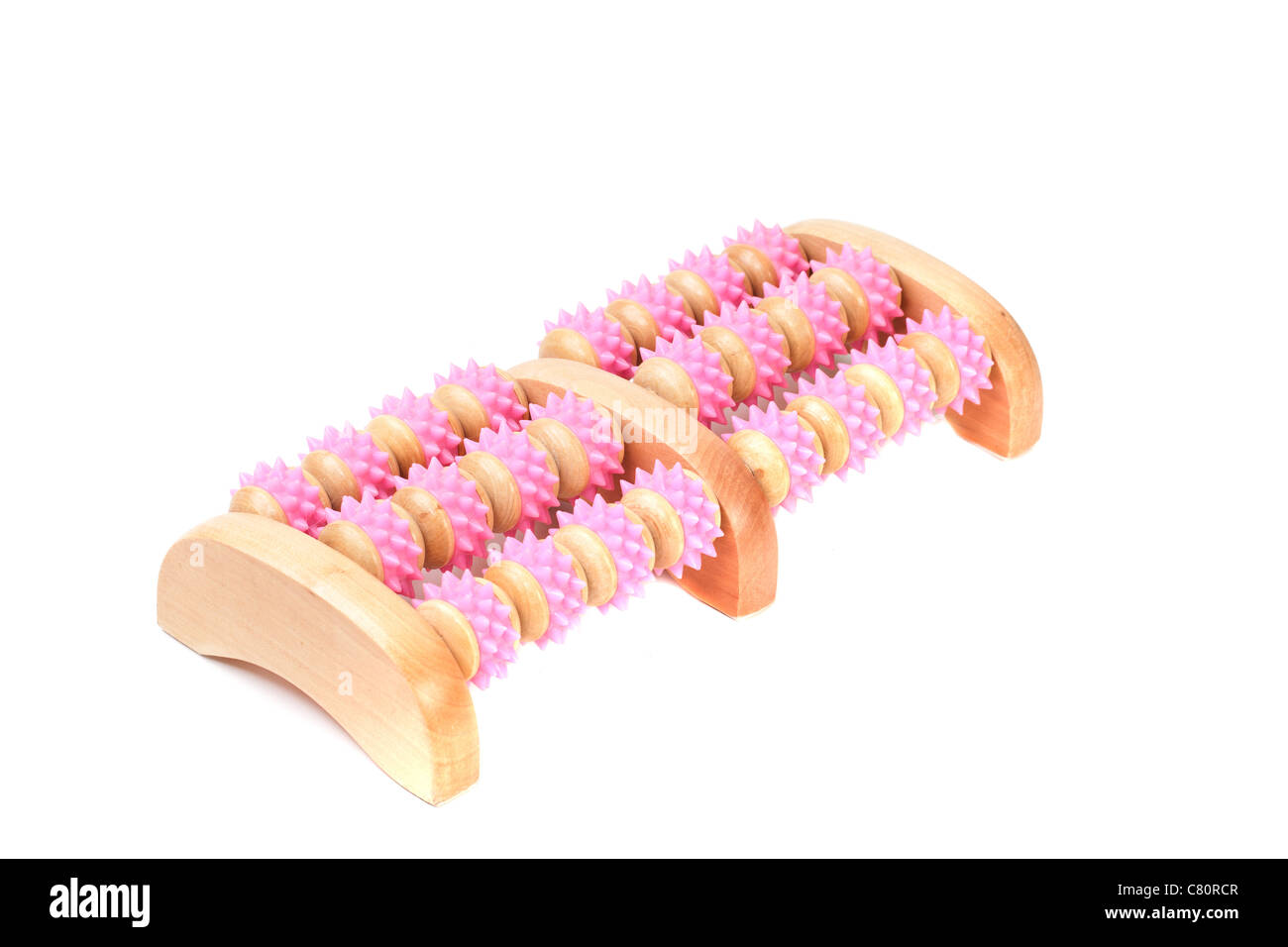 Wood foot massager device isolated on white background Stock Photo - Alamy