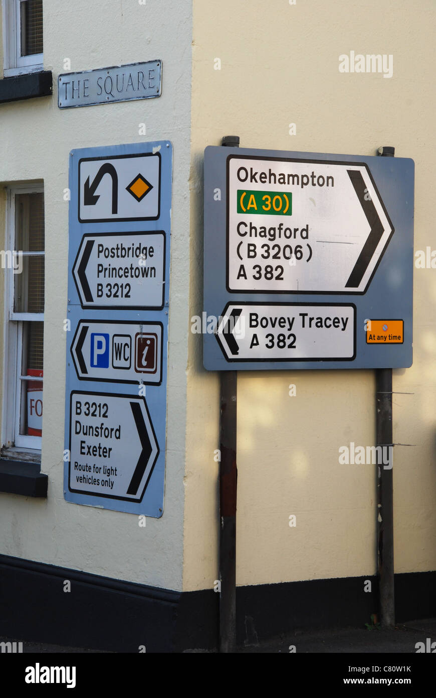 sign posts in town center of Moretonhampstead in Devon UK Stock Photo ...