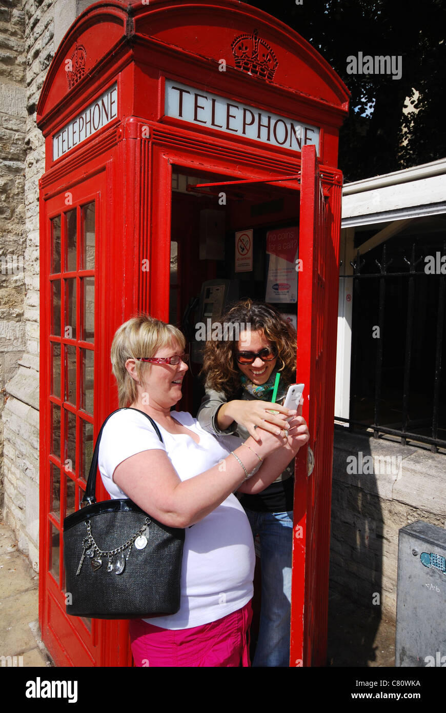 making a telephone call at the Carfax Tower Oxford UK Stock Photo - Alamy