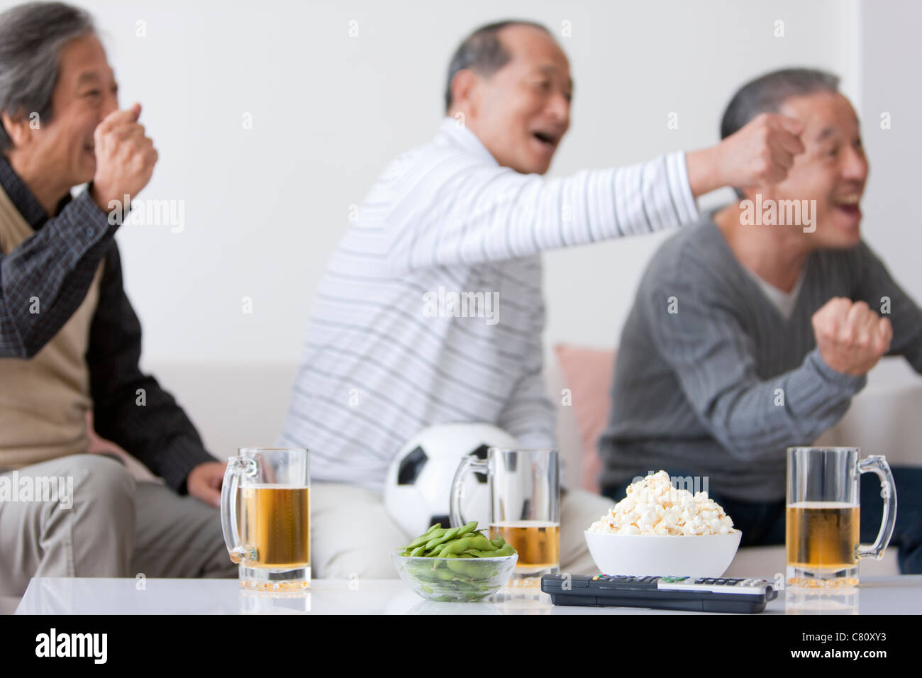 Man punching tv hi-res stock photography and images - Alamy