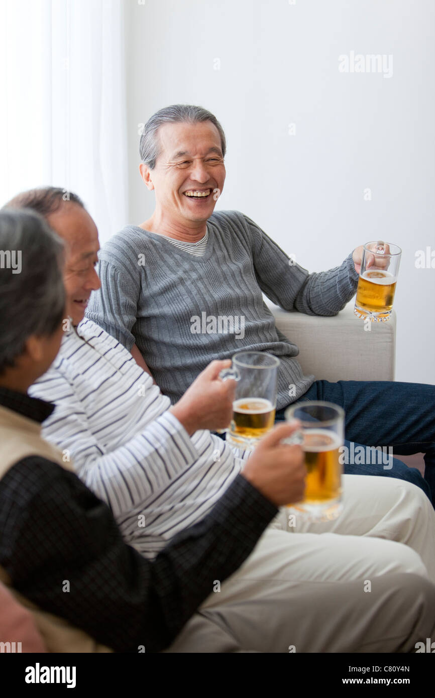 Three Senior Men Having Beer Stock Photo - Alamy
