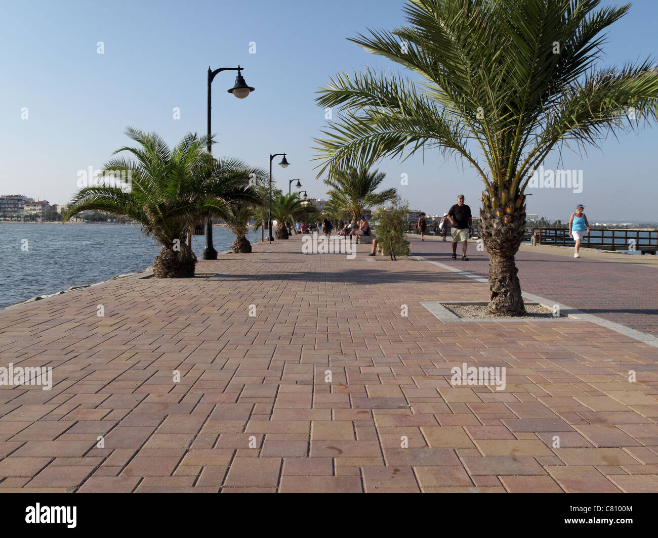 Walkways with palm trees at Lo Pagan, La Manga Spain Stock Photo - Alamy