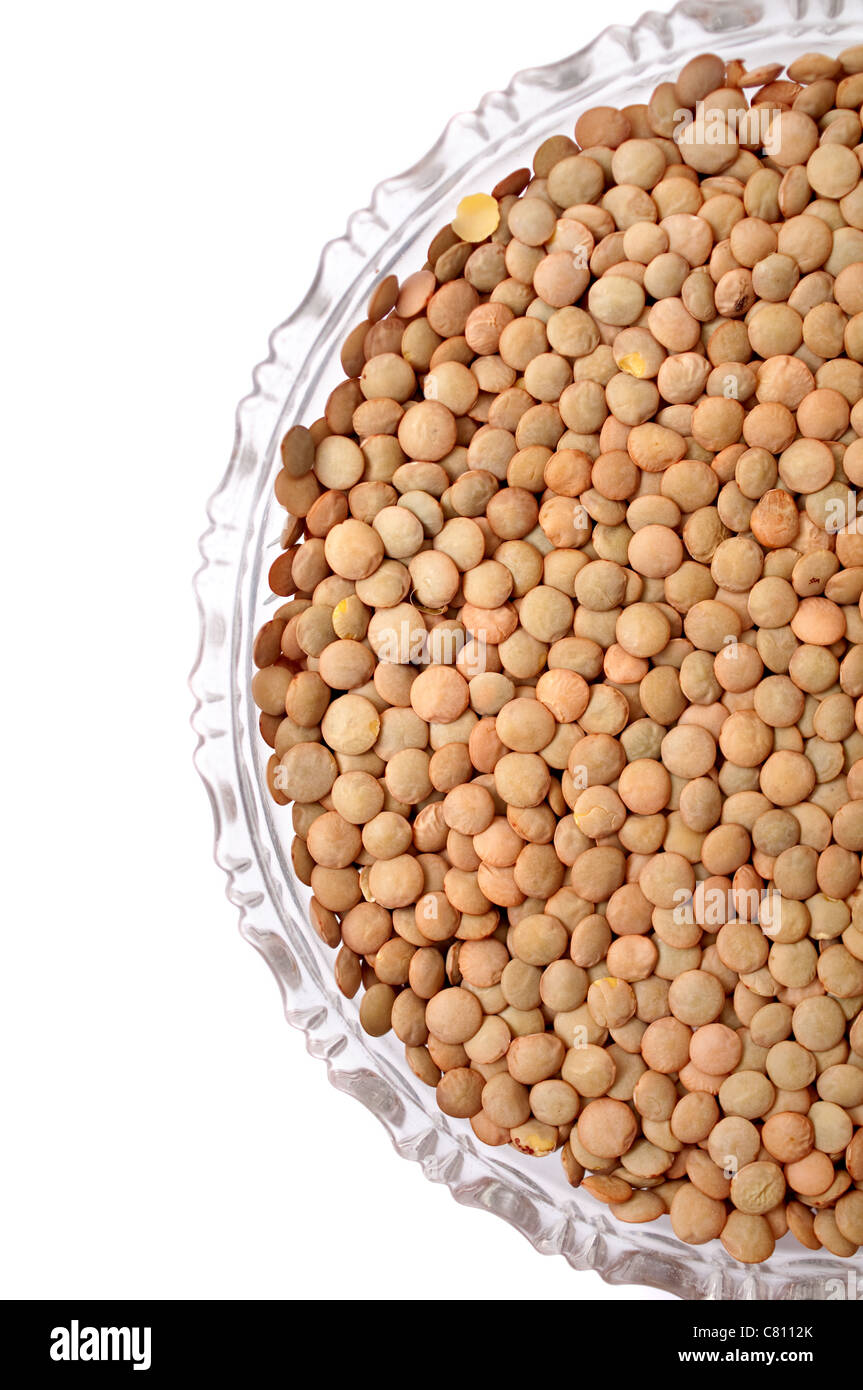 lentils in a glass plate isolated on white background Stock Photo - Alamy