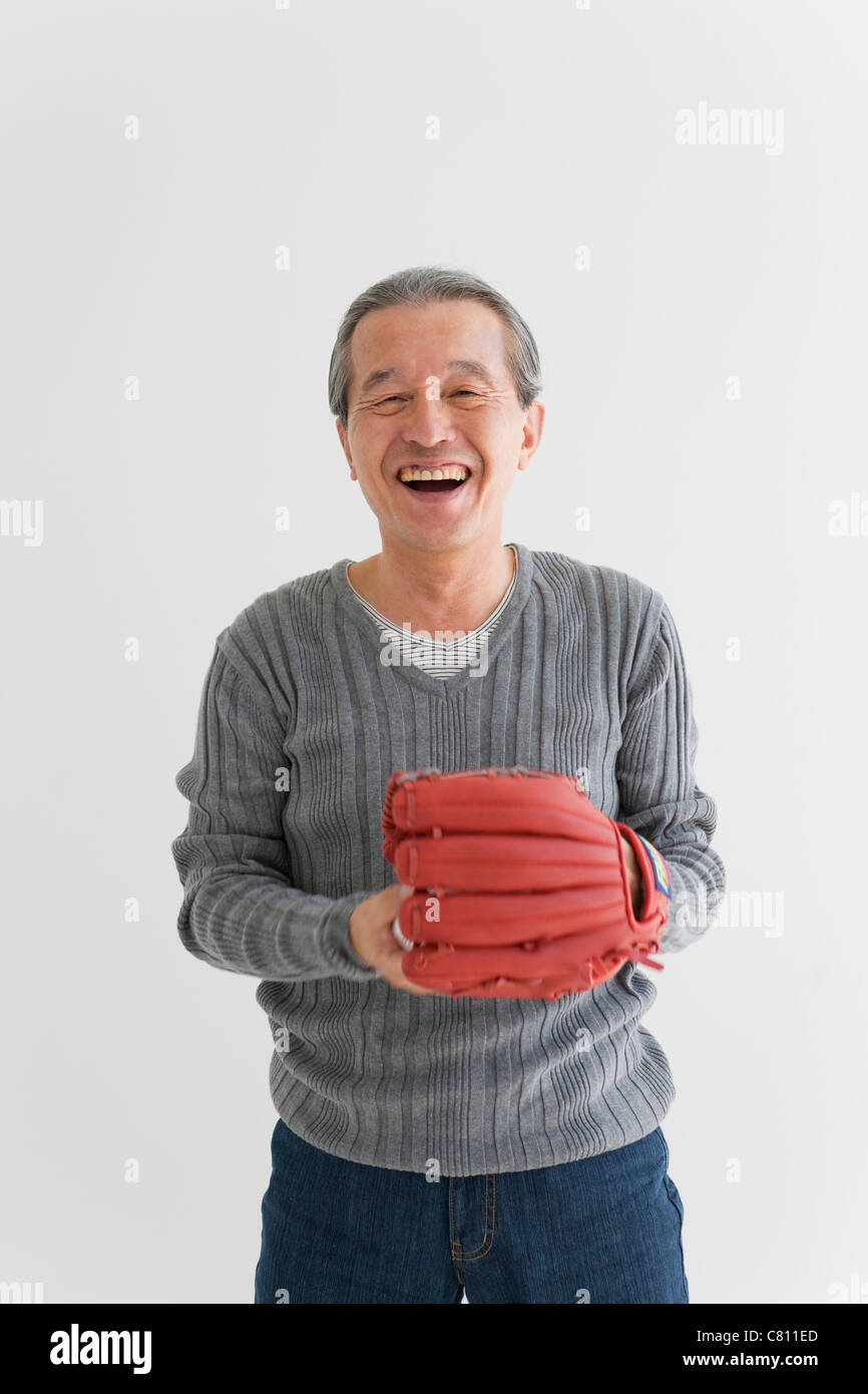 Senior Man with Baseball Mitt Stock Photo - Alamy