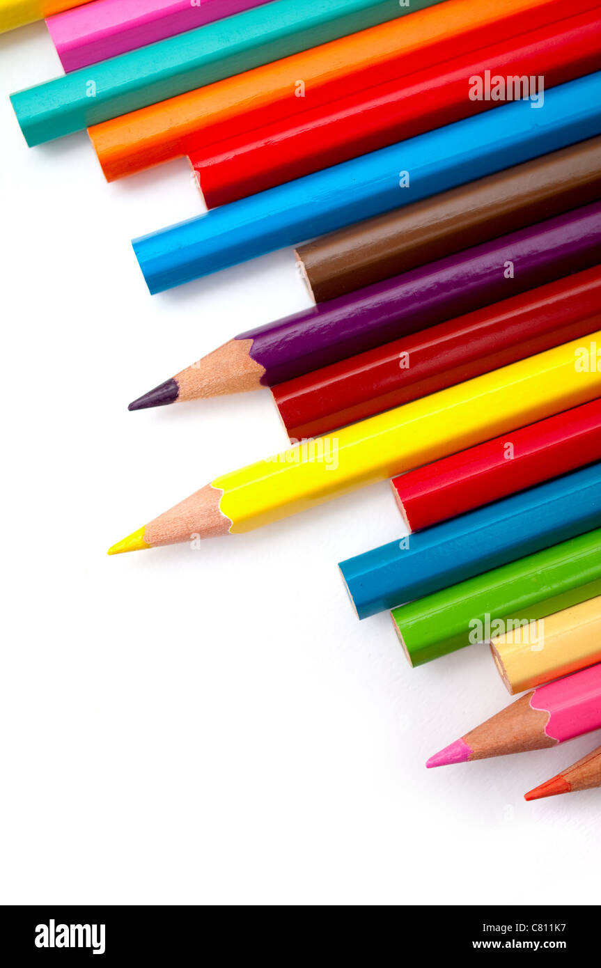 Close up of color pencils over white background Stock Photo - Alamy