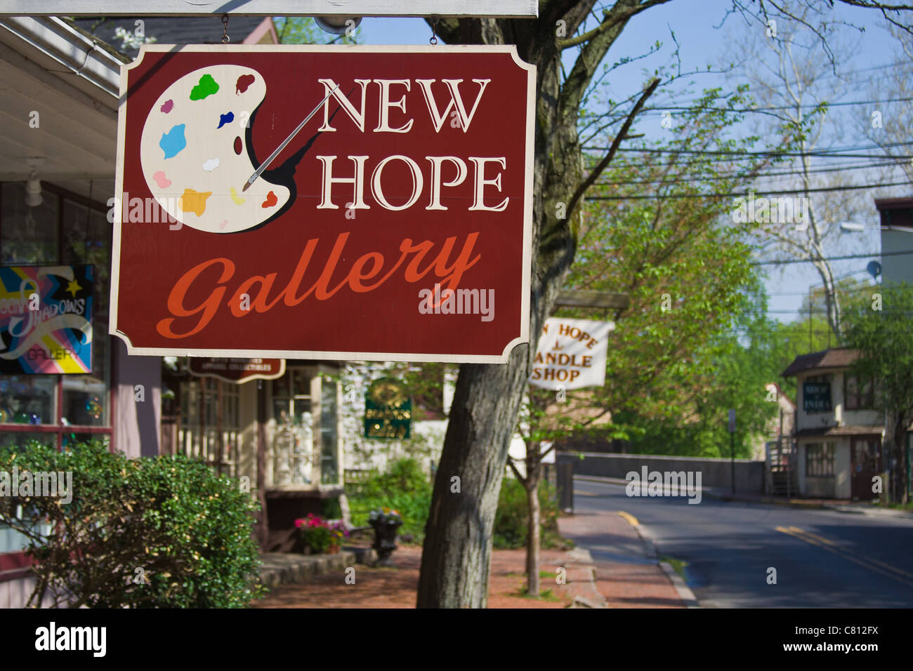 Sidewalk and store sign in New Hope, Pennsylvania Stock Photo - Alamy