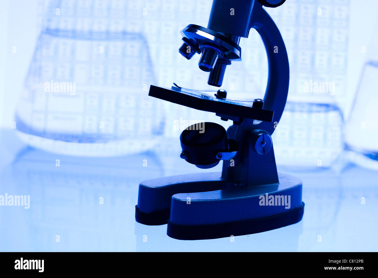 Microscope and atom & Laboratory glass Stock Photo - Alamy