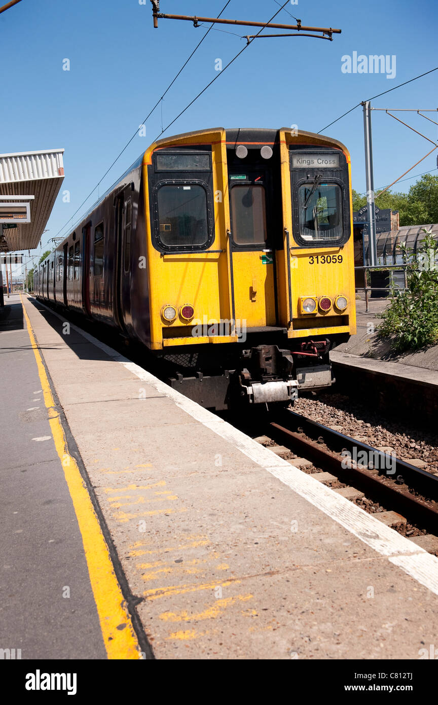 First capital connect train traveling to Kings Cross waiting at a ...