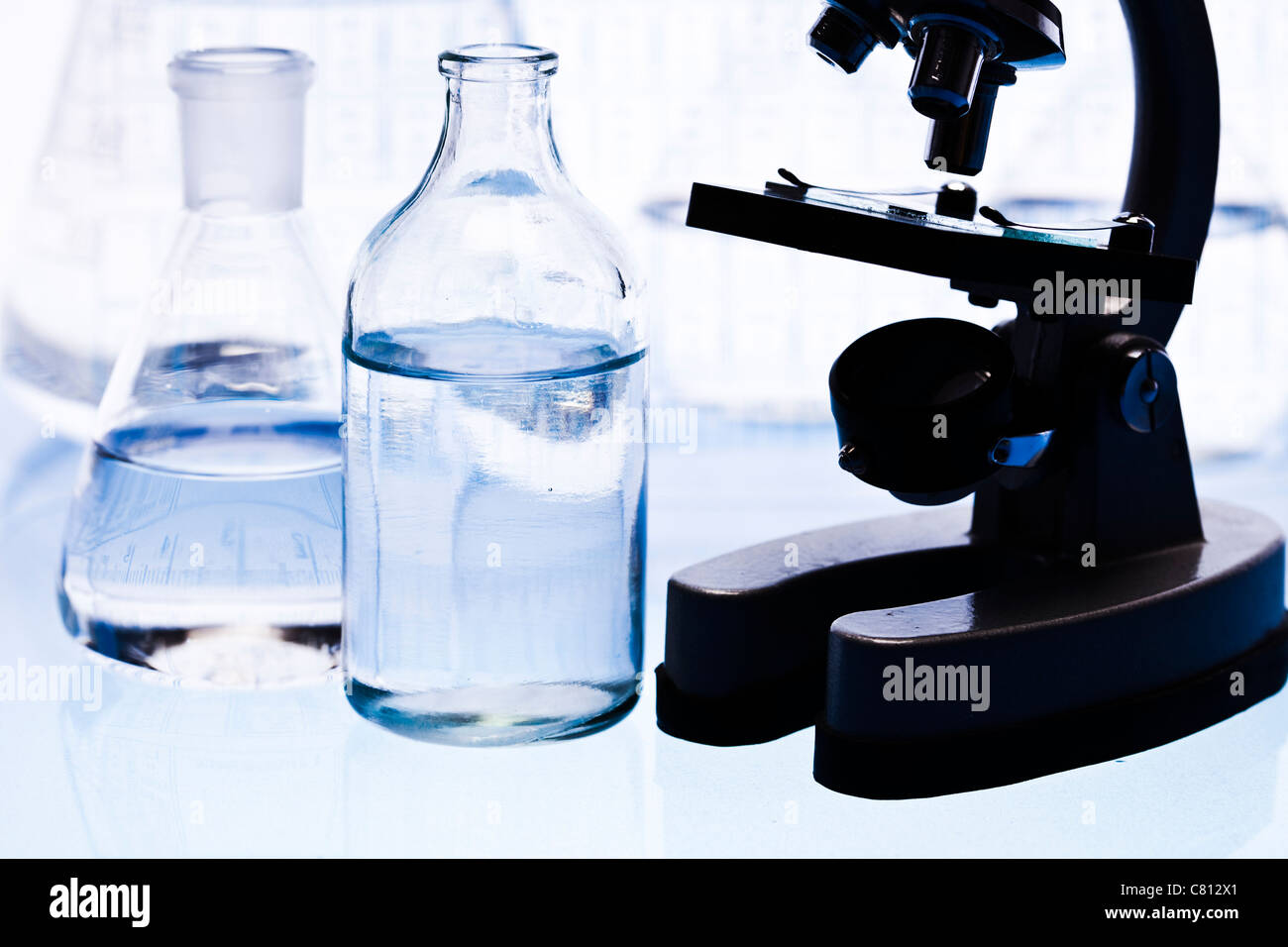 Microscope and atom & Laboratory glass Stock Photo - Alamy