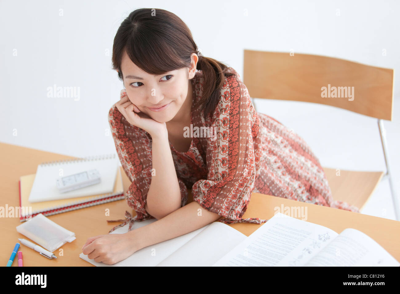 College Student at Desk Stock Photo - Alamy