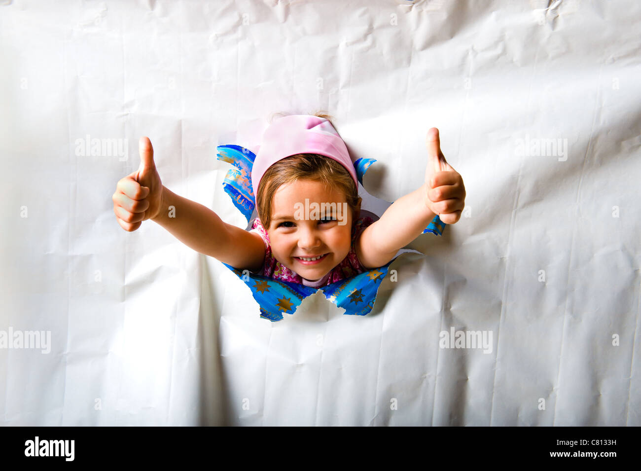 Child tearing paper hi-res stock photography and images - Alamy