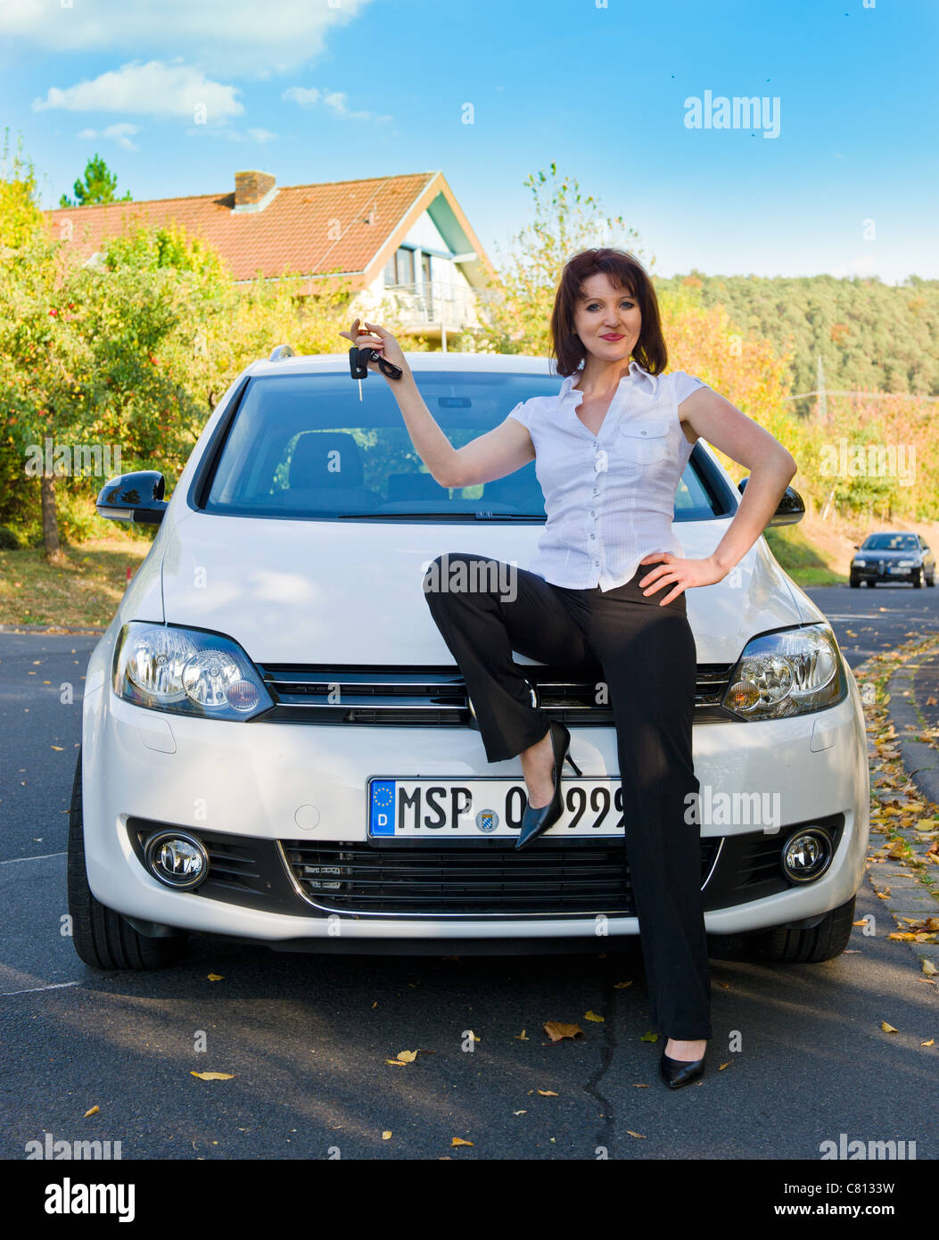Women with a car Stock Photo - Alamy
