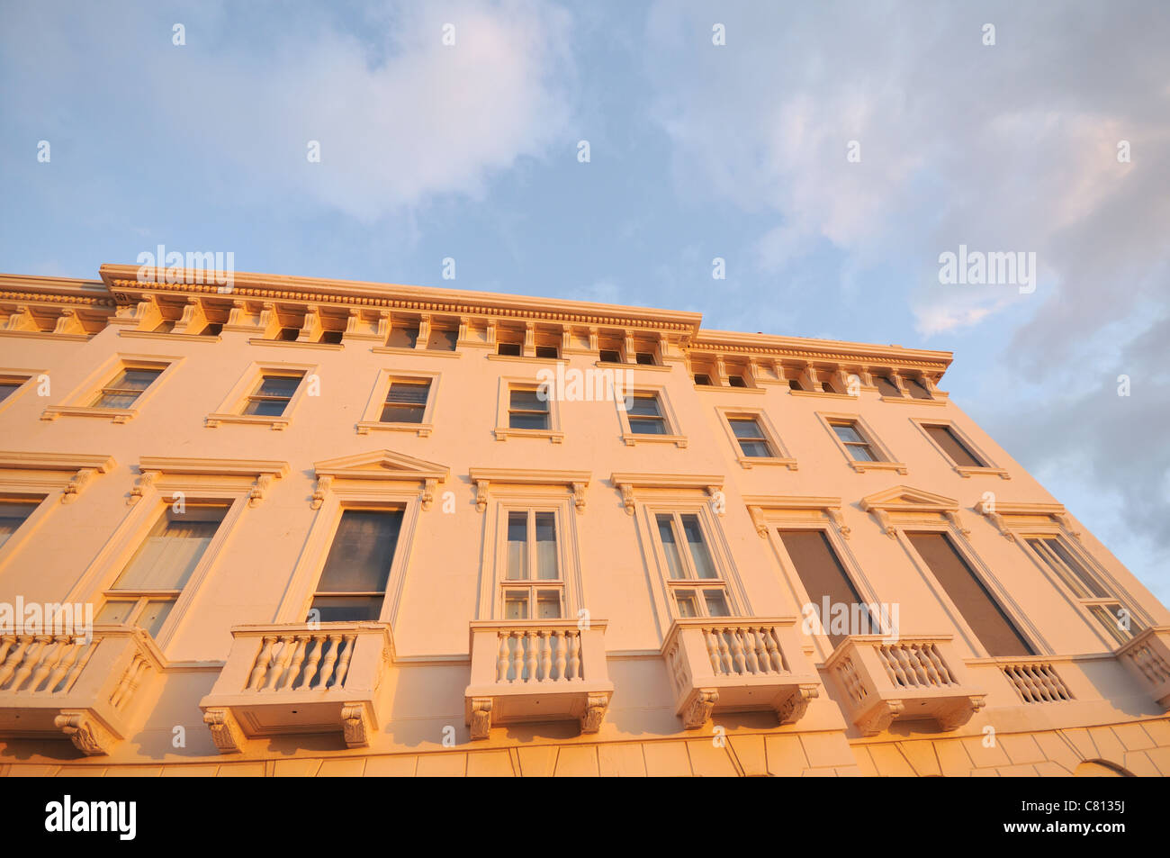 Regency style housing on the Brighton seafront at dusk, Brighton, East ...