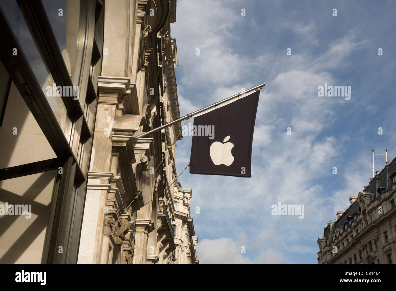 Looking up at the corporate flag of Apple's logo on a banner high above ...