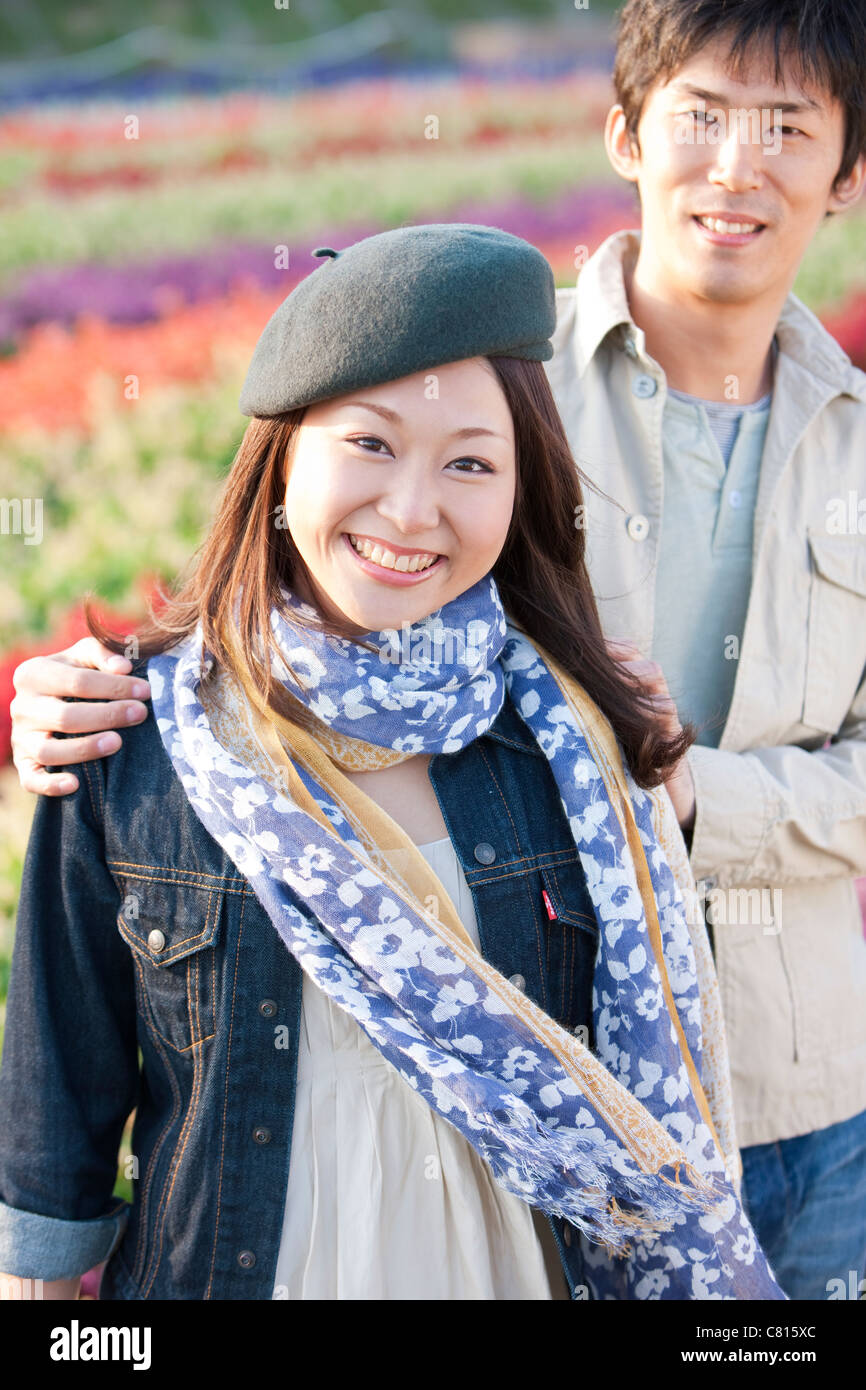 Mid Adult Couple in Field Stock Photo - Alamy