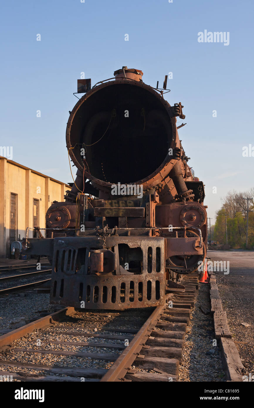 Old rusted steam locomotive in train yard Stock Photo - Alamy