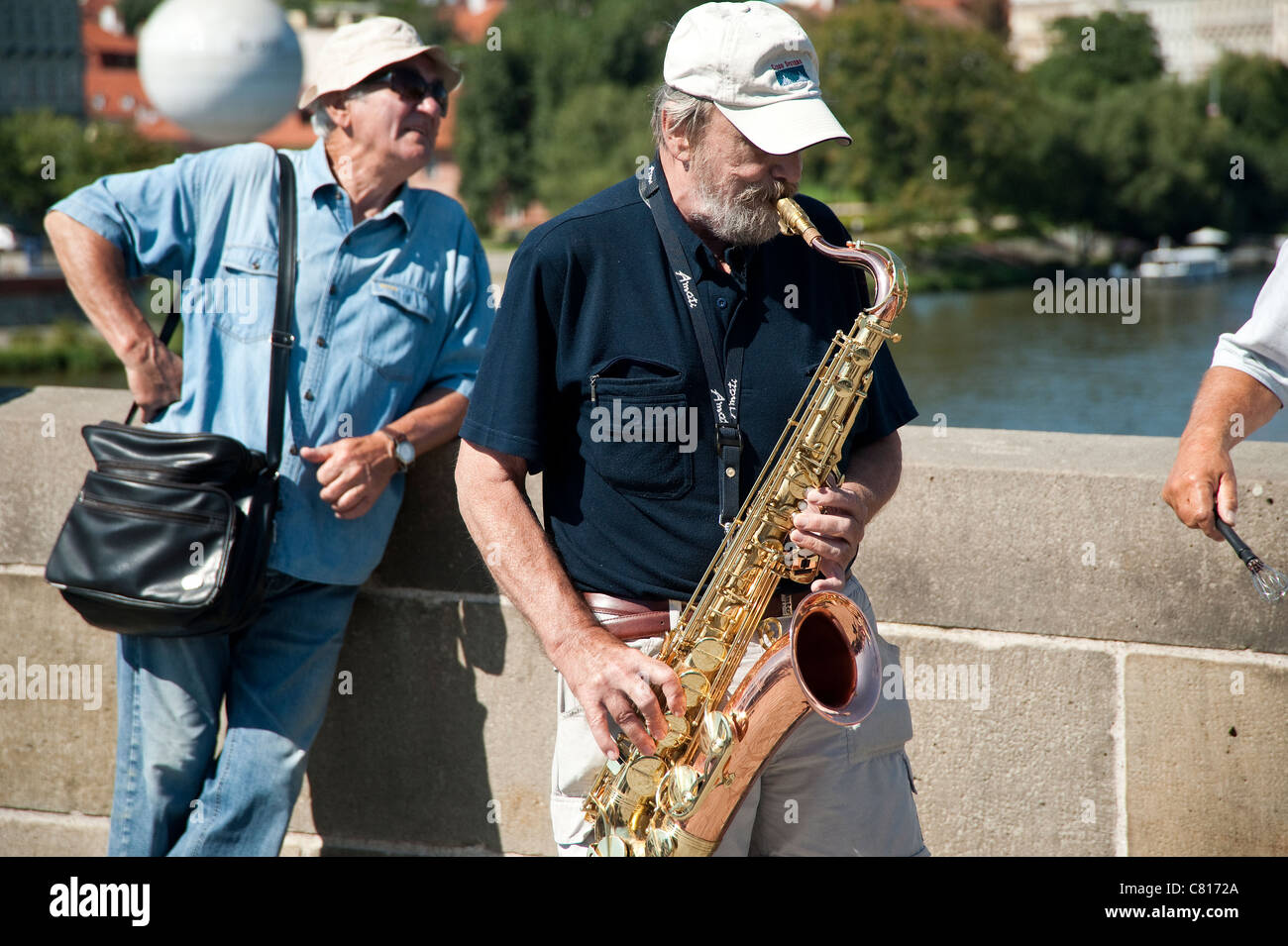 Man playing saxophone on street hi-res stock photography and images - Alamy