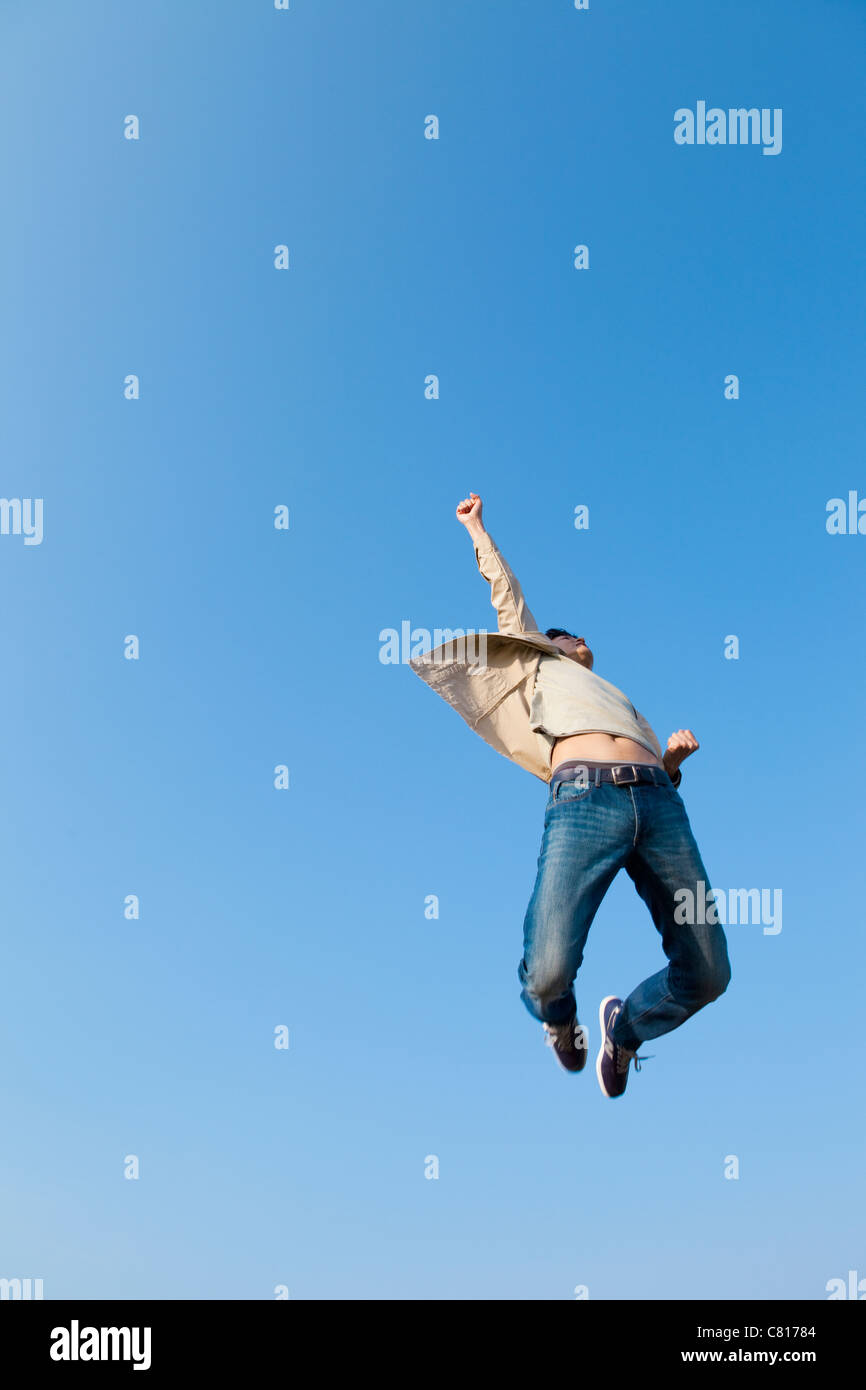 Man jumping and punching in air hi-res stock photography and images - Alamy